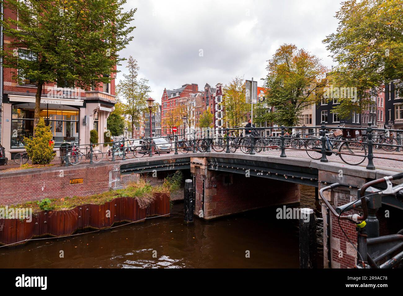 Amsterdam, NL - October 10, 2021: Canals and typical dutch architecture ...