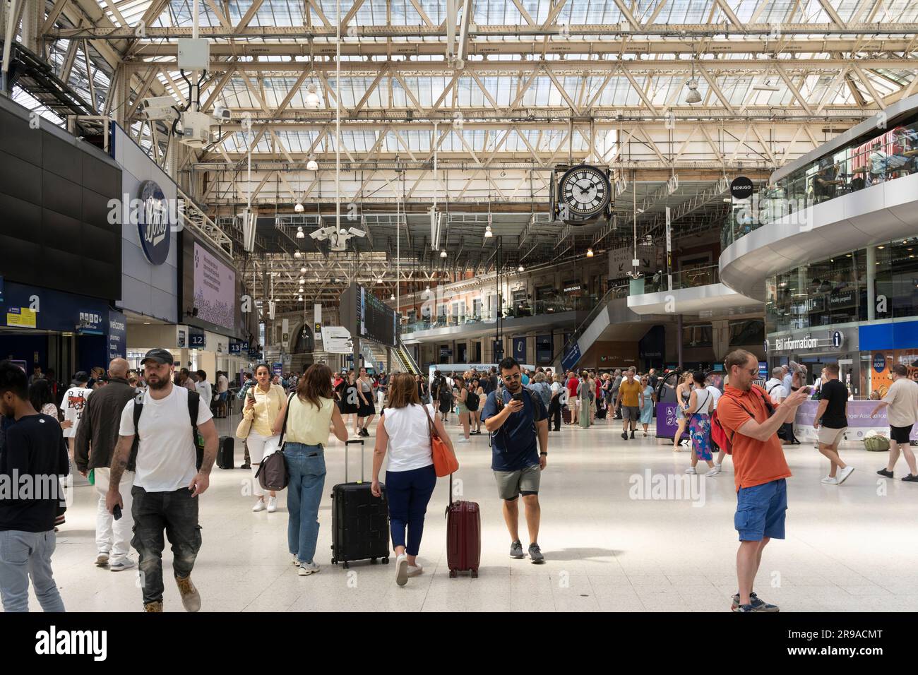 People Walking Through London Waterloo Train Station Concourse And