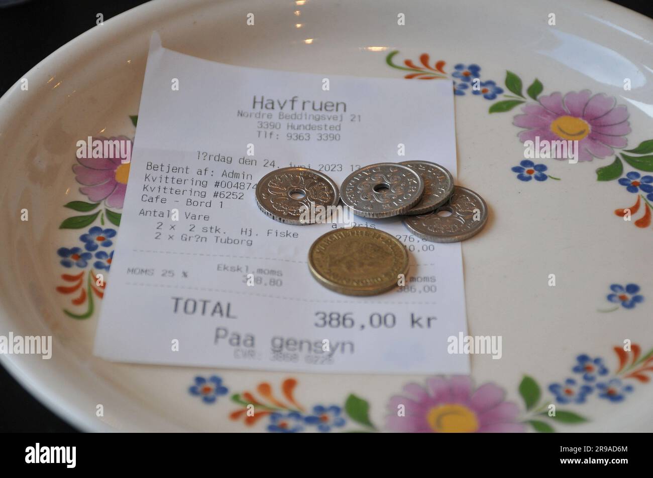 24 June 2023/Visitor enjoy sea food dish menu at danish tiny habour ...
