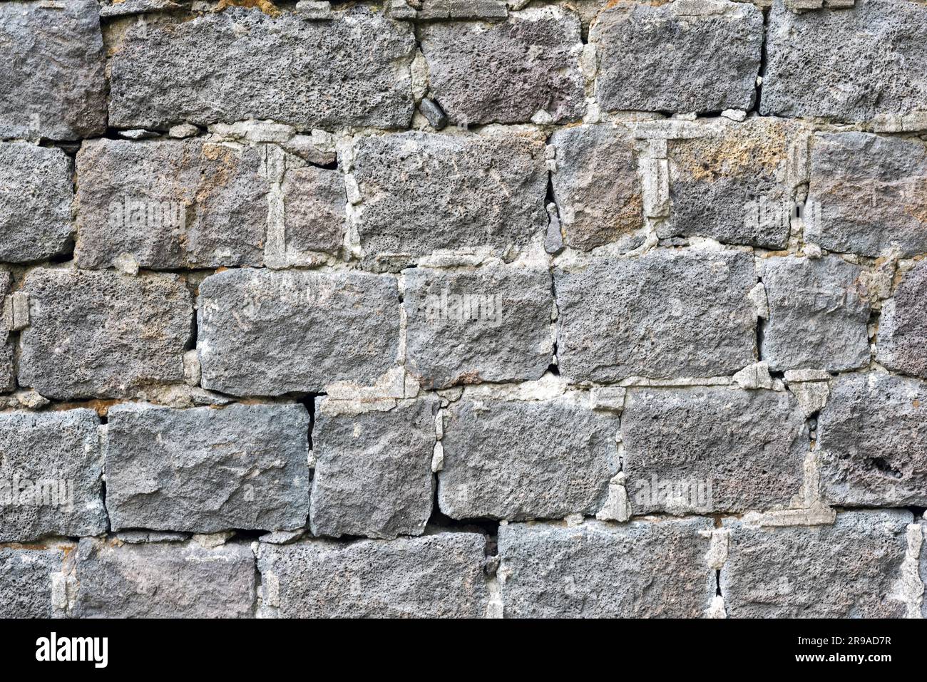 Background from an old, grey natural stone wall Stock Photo - Alamy