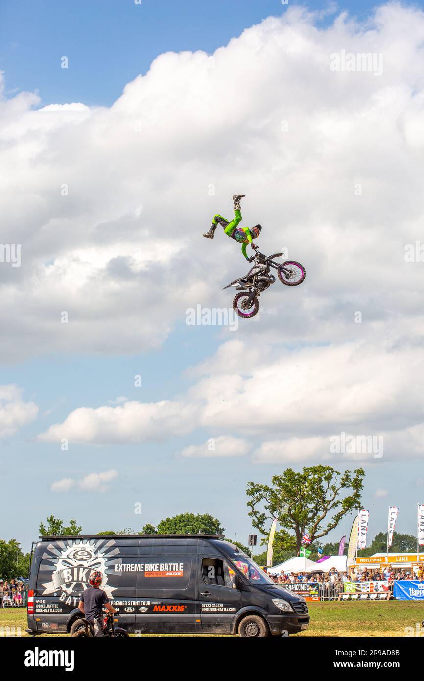 Motorcycle stunt rider from the extreme bike battle display team doing ...