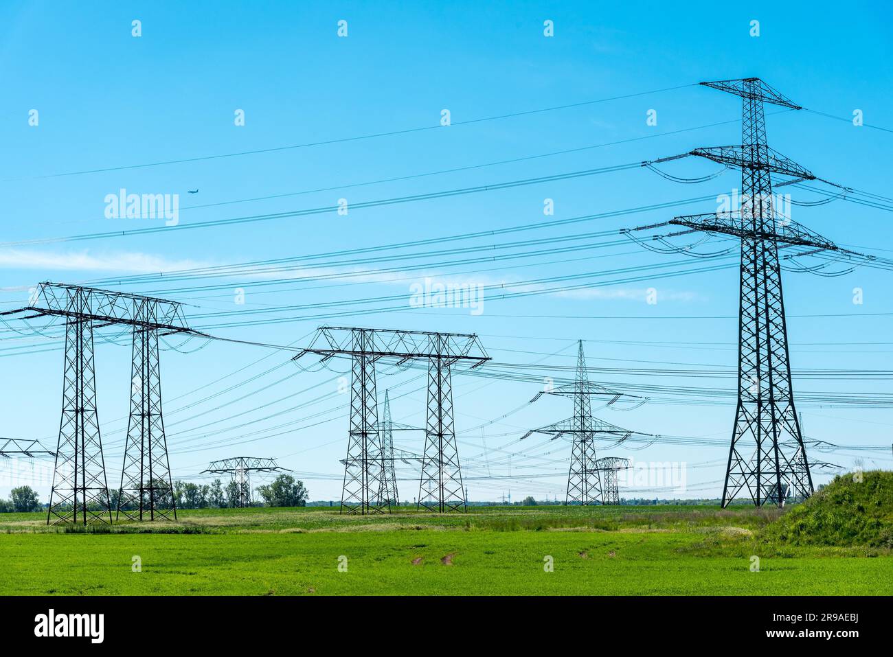 Power transmission lines and pylons in Germany Stock Photo - Alamy