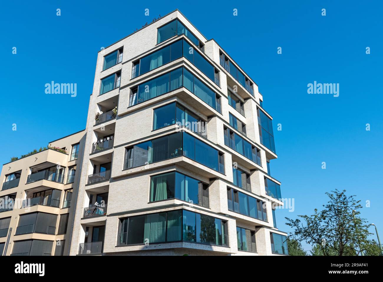Modern apartment building with lots of glass seen in Berlin, Germany ...