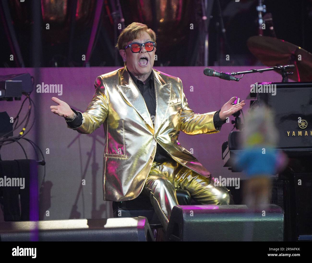 EDITORIAL USE ONLY Elton John performing on the Pyramid Stage at the ...