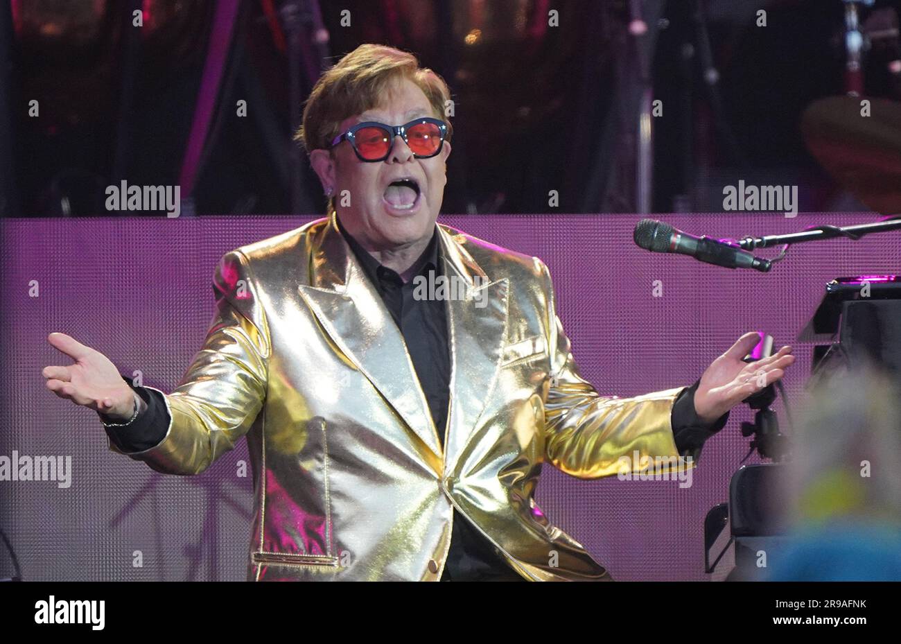 EDITORIAL USE ONLY Elton John performing on the Pyramid Stage at the ...