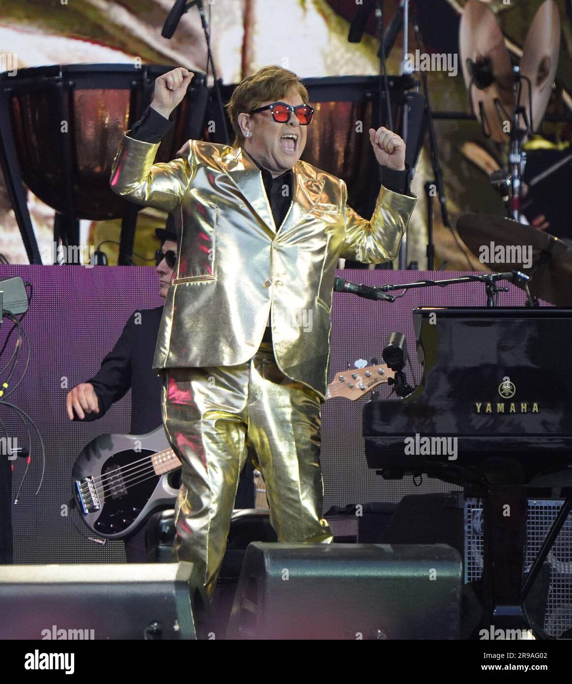 EDITORIAL USE ONLY Elton John performing on the Pyramid Stage at the ...