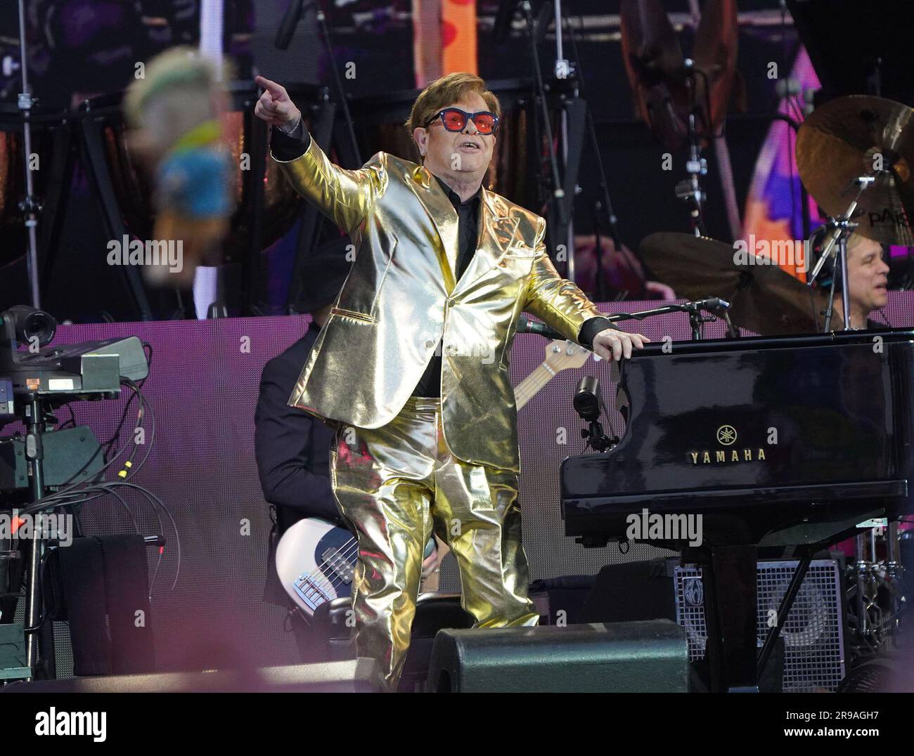 EDITORIAL USE ONLY Elton John performing on the Pyramid Stage at the ...