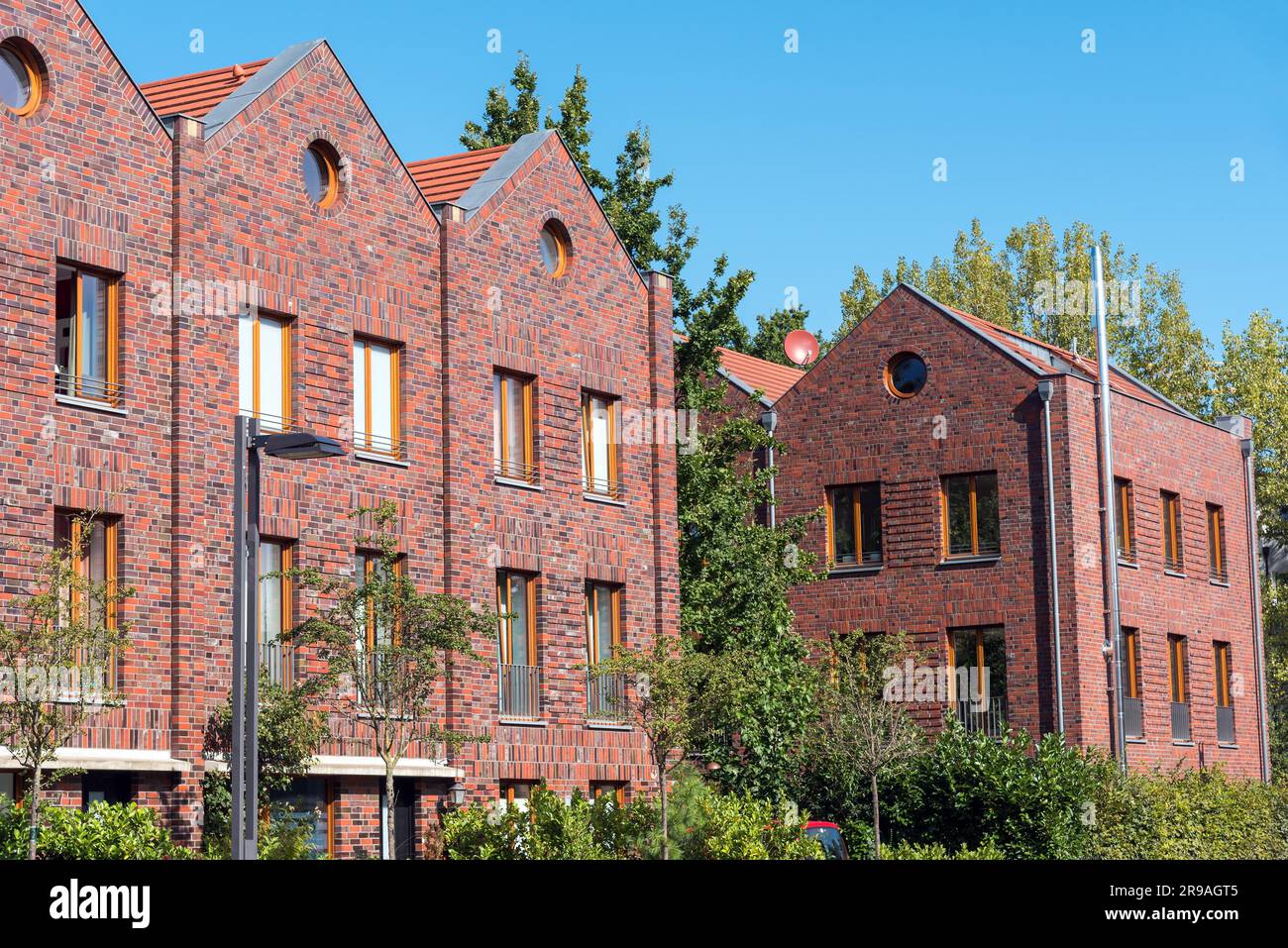 Row houses made of red brick seen in Berlin, Germany Stock Photo - Alamy