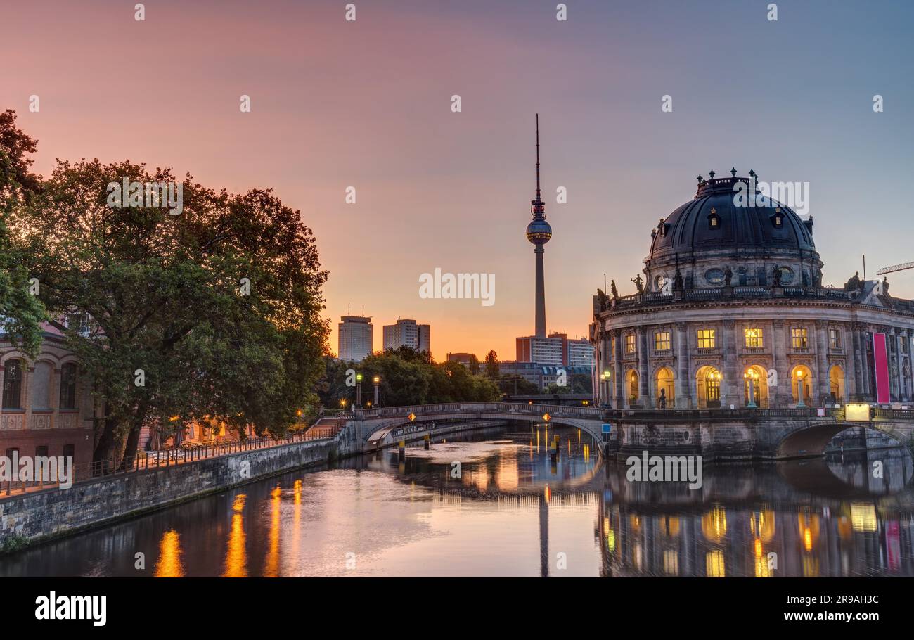 Beautiful sunrise at the Bodemuseum in Berlin with the TV tower in the ...