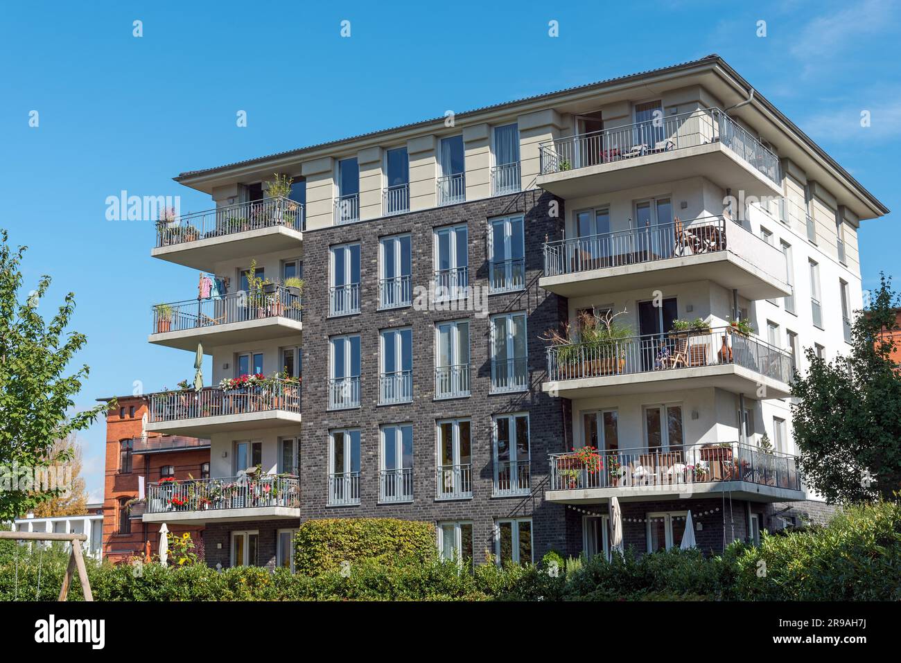 New grey apartment building in Berlin, Germany Stock Photo - Alamy