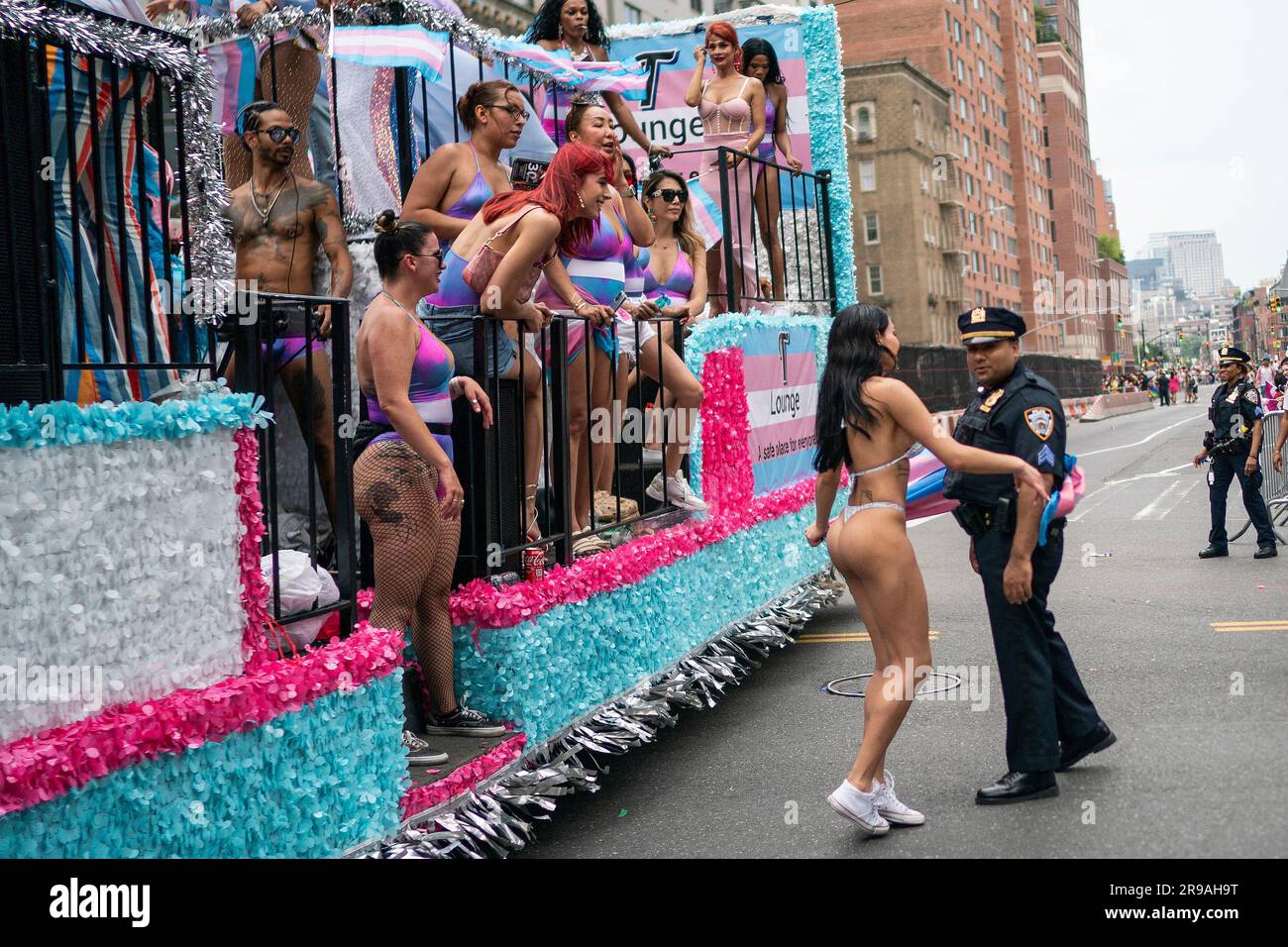 A Reveler Jokes With A Police Officer During The Nyc Pride March Sunday June 25 2023 In New
