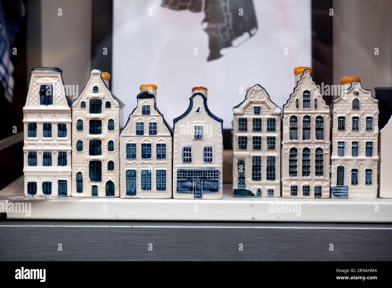 Traditional delftware of Dutch houses in a shop window, touristic ...