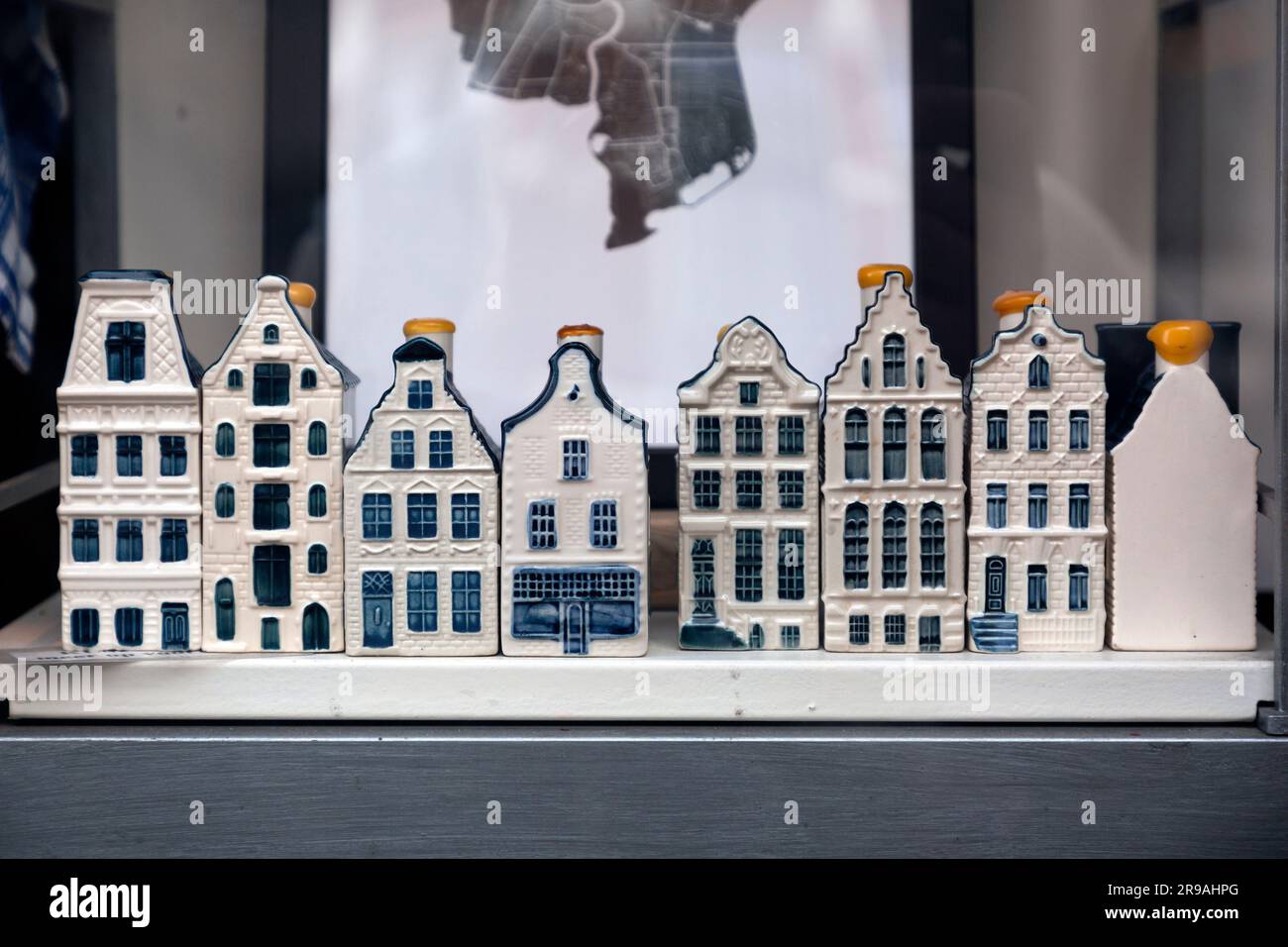 Traditional delftware of Dutch houses in a shop window, touristic ...