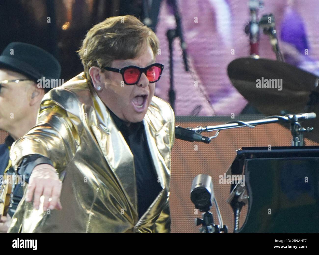 EDITORIAL USE ONLY Elton John performing on the Pyramid Stage at the ...