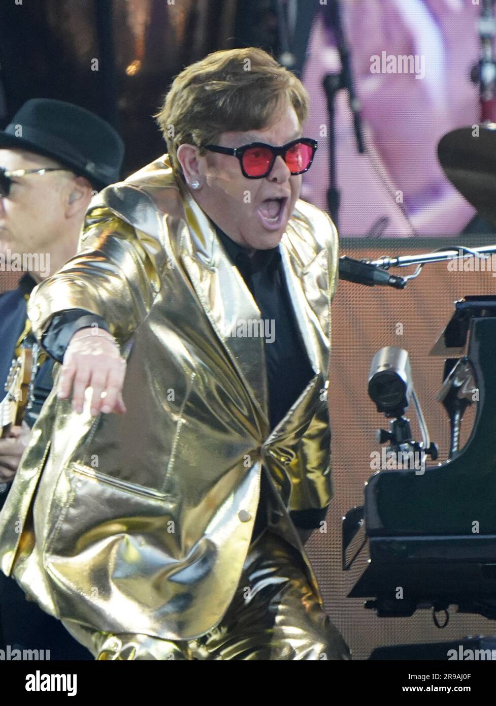 EDITORIAL USE ONLY Elton John performing on the Pyramid Stage at the ...