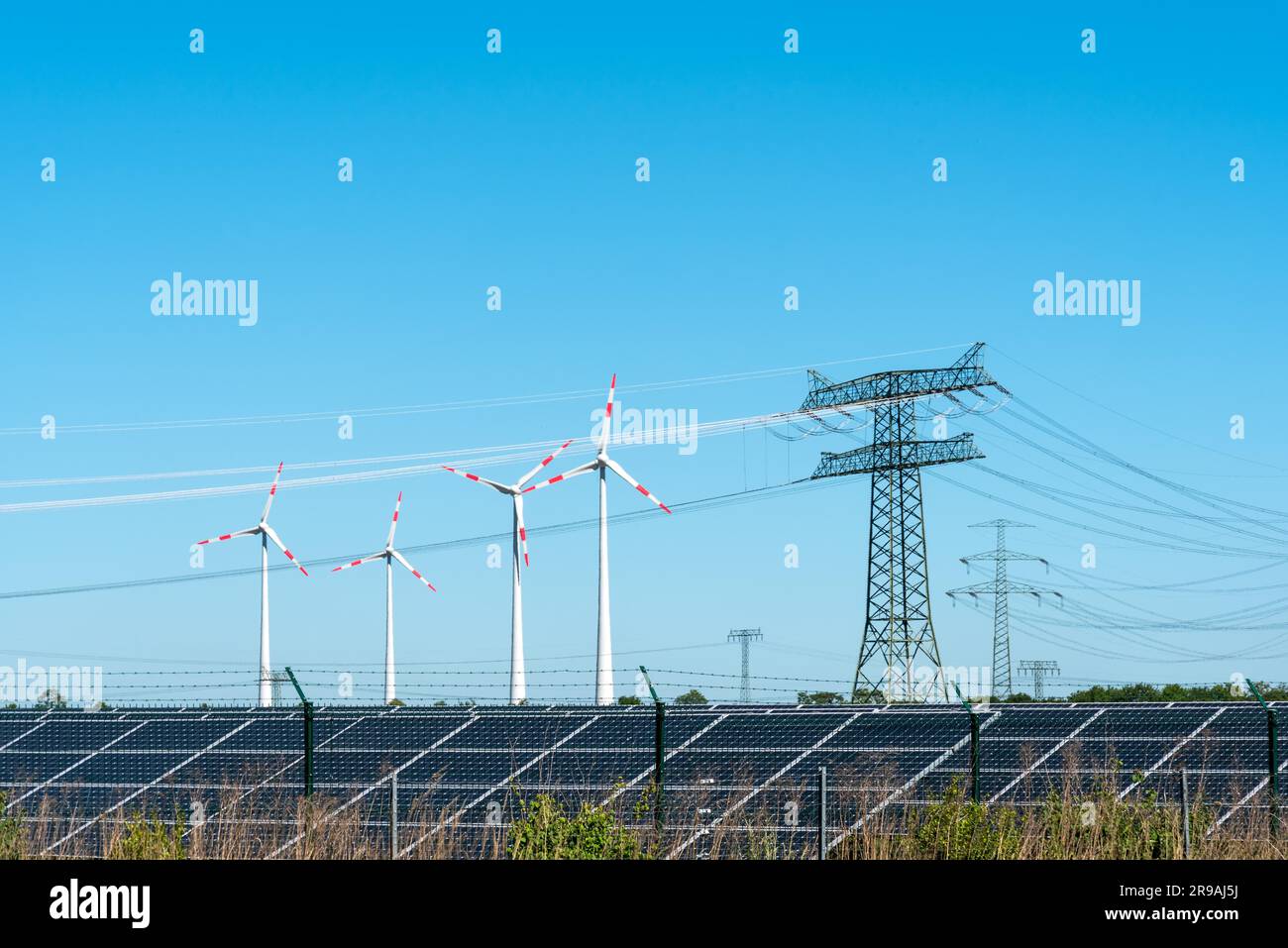 Renewable energy generation and power lines in Germany Stock Photo - Alamy