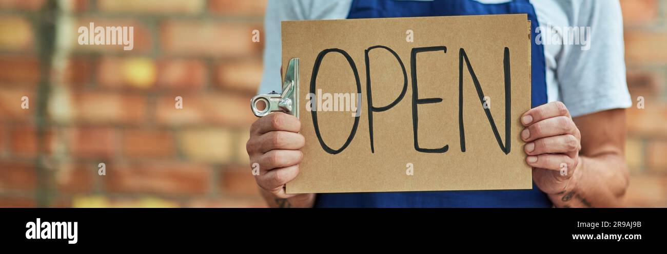 Middle aged caucasian small business owner with sign Open Stock Photo ...