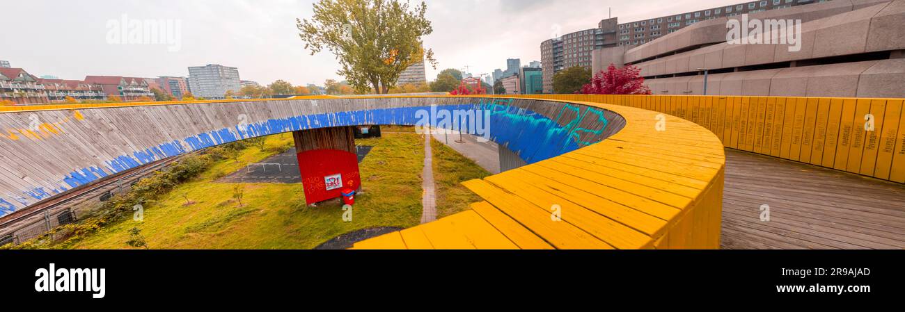 Rotterdam, Netherlands - October 10, 2021: The Luchtsingel is a yellow ...