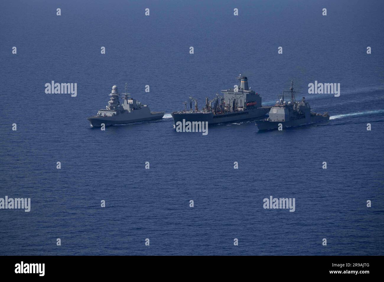 The Italian Navy frigate Alpino (F 594), left, and Ticonderoga-class ...
