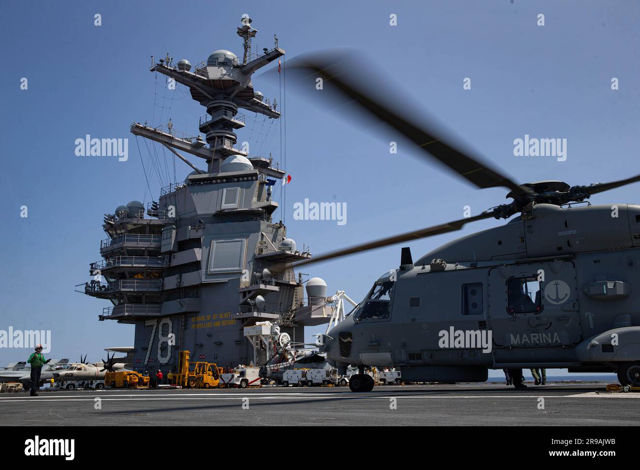 An NH90 NATO Frigate Helicopter lands on the flight deck of the world's ...