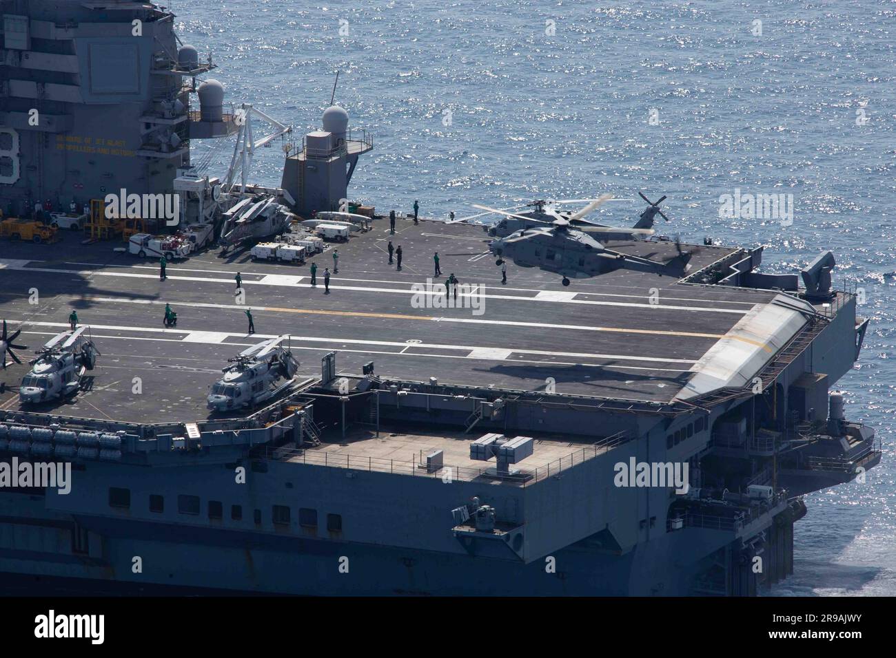 An NH90 NATO Frigate Helicopter approaches the flight deck of the ...