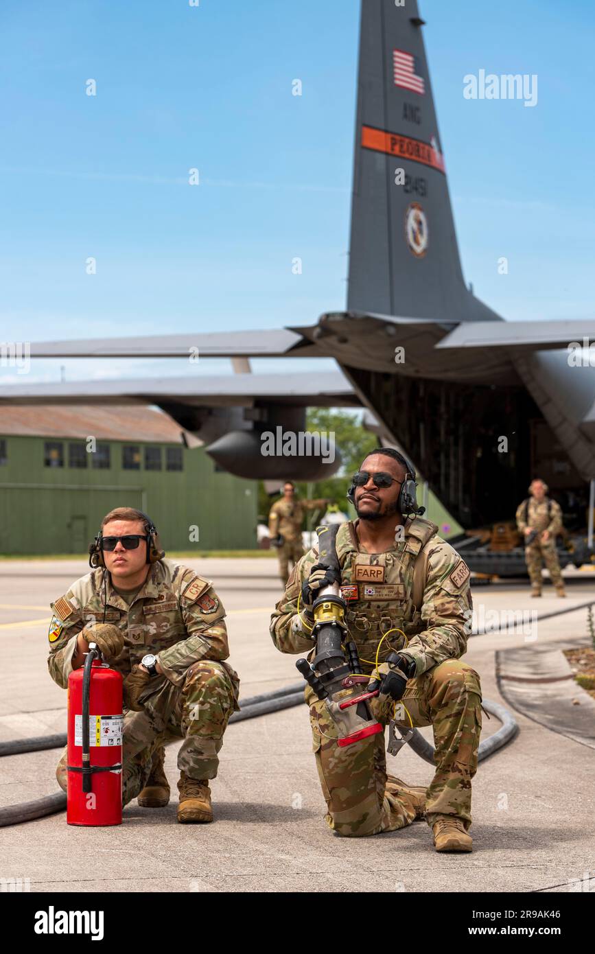 U.S. Air Force Tech. Sgt. Moises Rodrigues, left, a crew chief with the ...