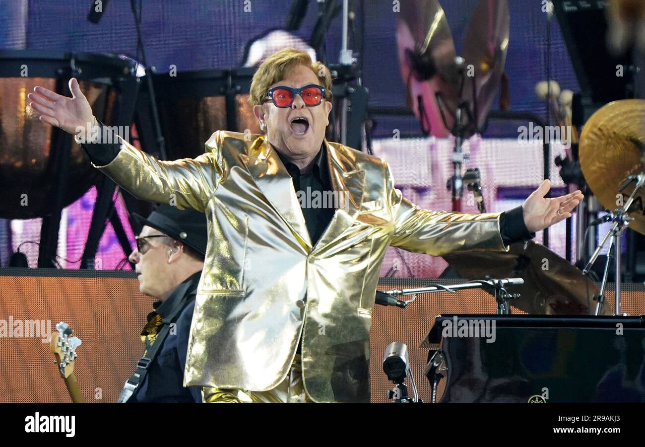 EDITORIAL USE ONLY Elton John performing on the Pyramid Stage at the ...