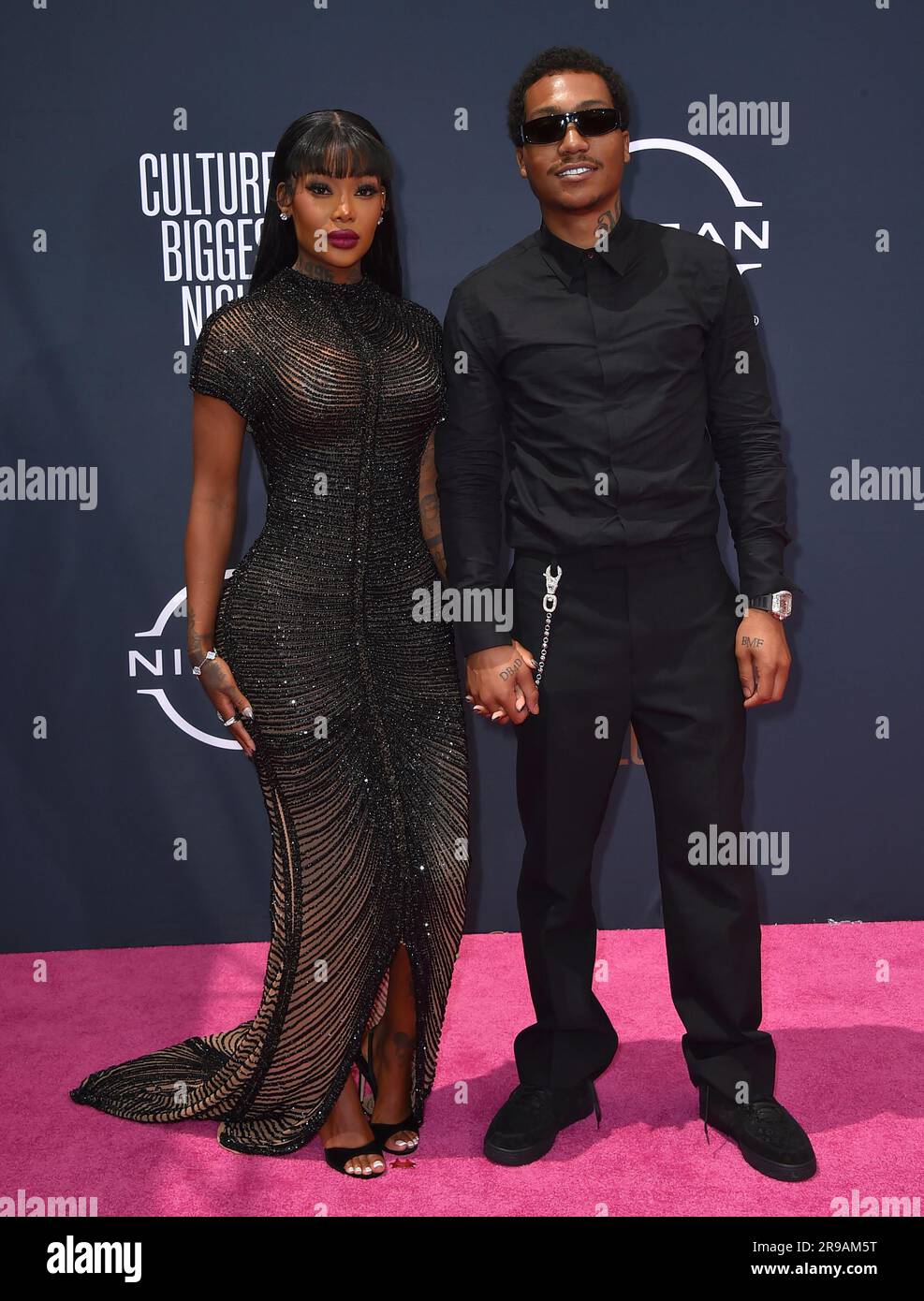 Summer Walker, left, and Lil Meech arrive at the BET Awards on Sunday ...