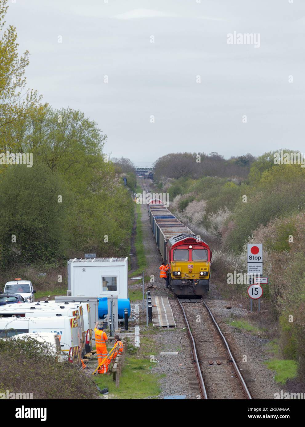 DB Cargo rail UK class 66 diesel locomotive hauling a train of empty ...