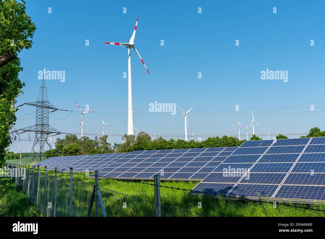 Solar plant, wind turbines and electricity pylons in Germany Stock ...