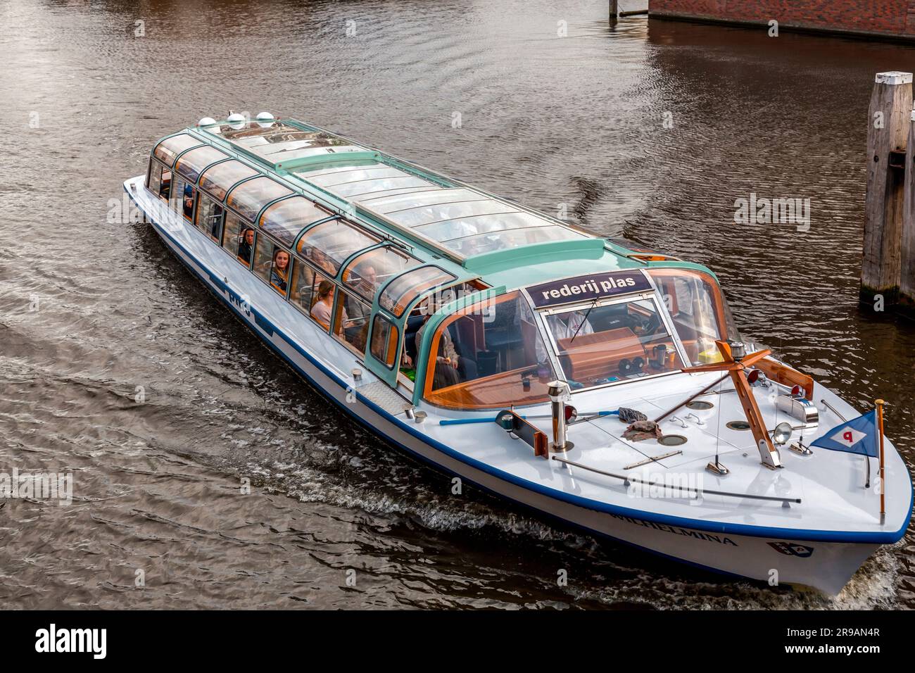 Amsterdam, NL - October 11, 2021: Canals and typical tour boats in ...