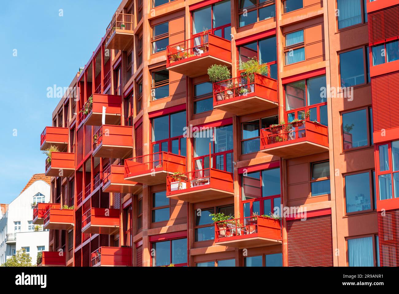 Modern red apartment buildings seen in Berlin, Germany Stock Photo - Alamy