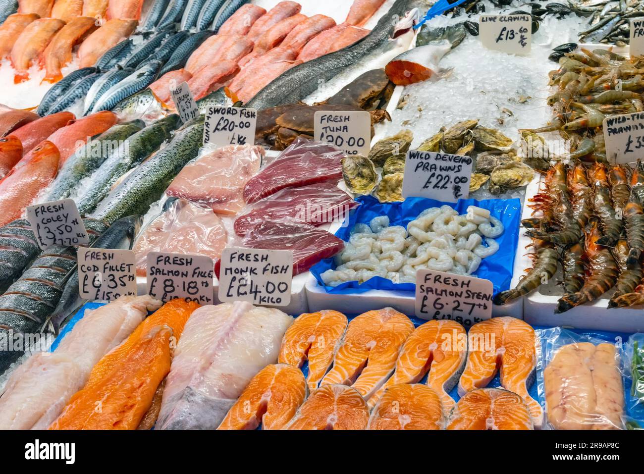 Fresh fish and seafood for sale at a market in Brixton, London Stock ...