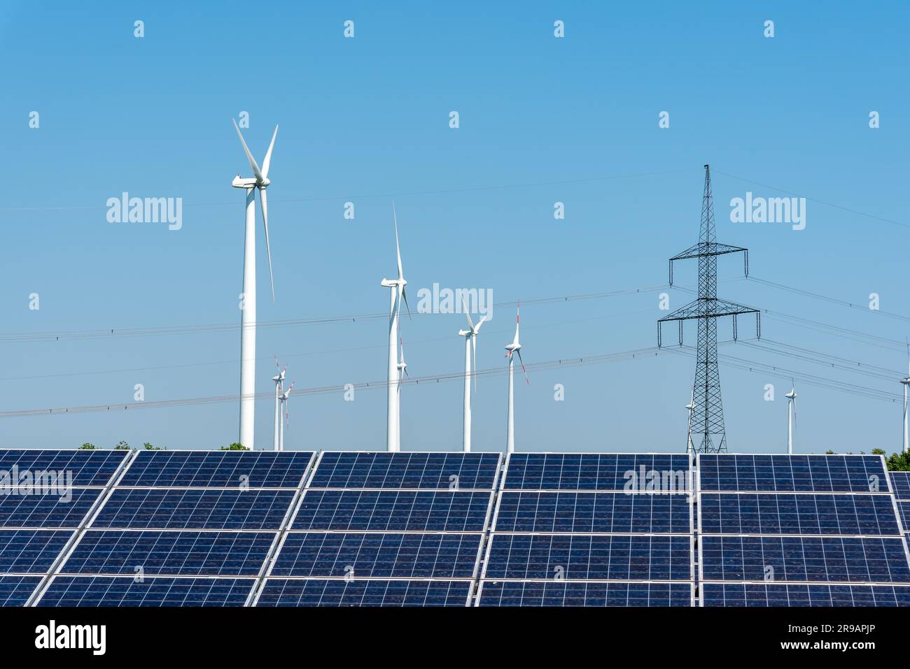 Electricity pylons, solar plants and wind turbines in Germany Stock ...