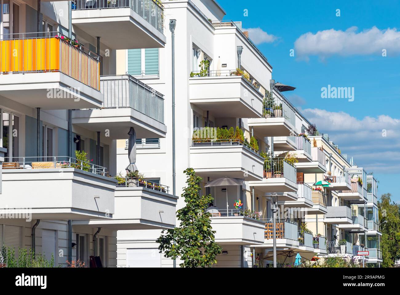 Many balconies of modern apartment buildings seen in Berlin, Germany ...