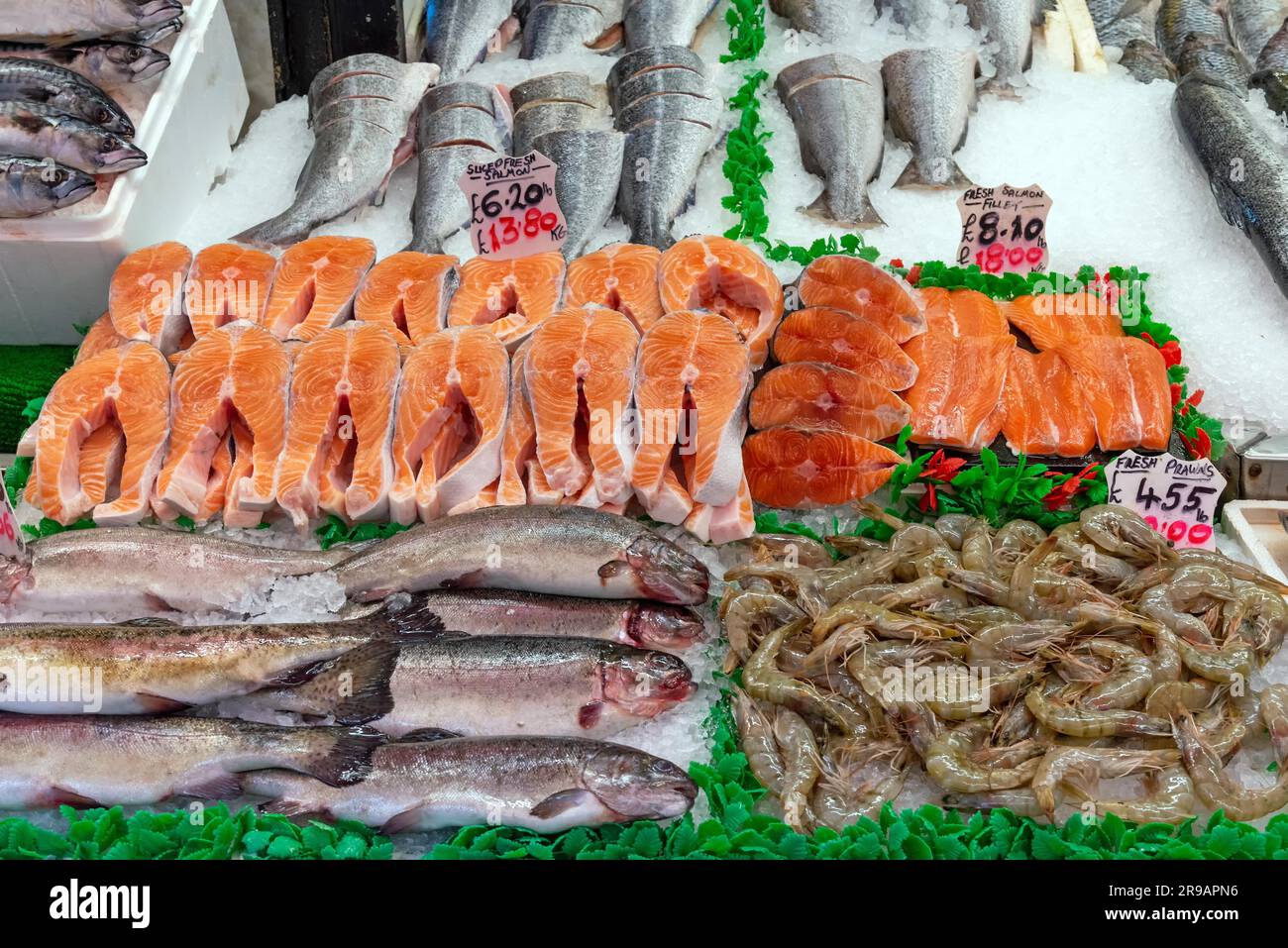 Salmon and prawns for sale at a market in London Stock Photo - Alamy