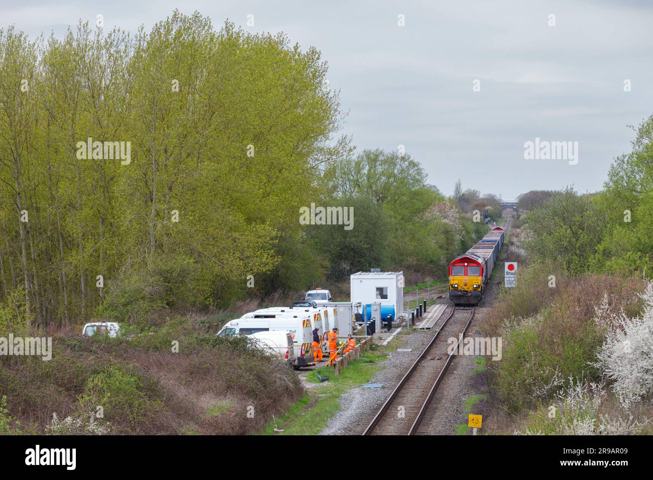 DB Cargo rail UK class 66 diesel locomotive hauling a train of empty ...