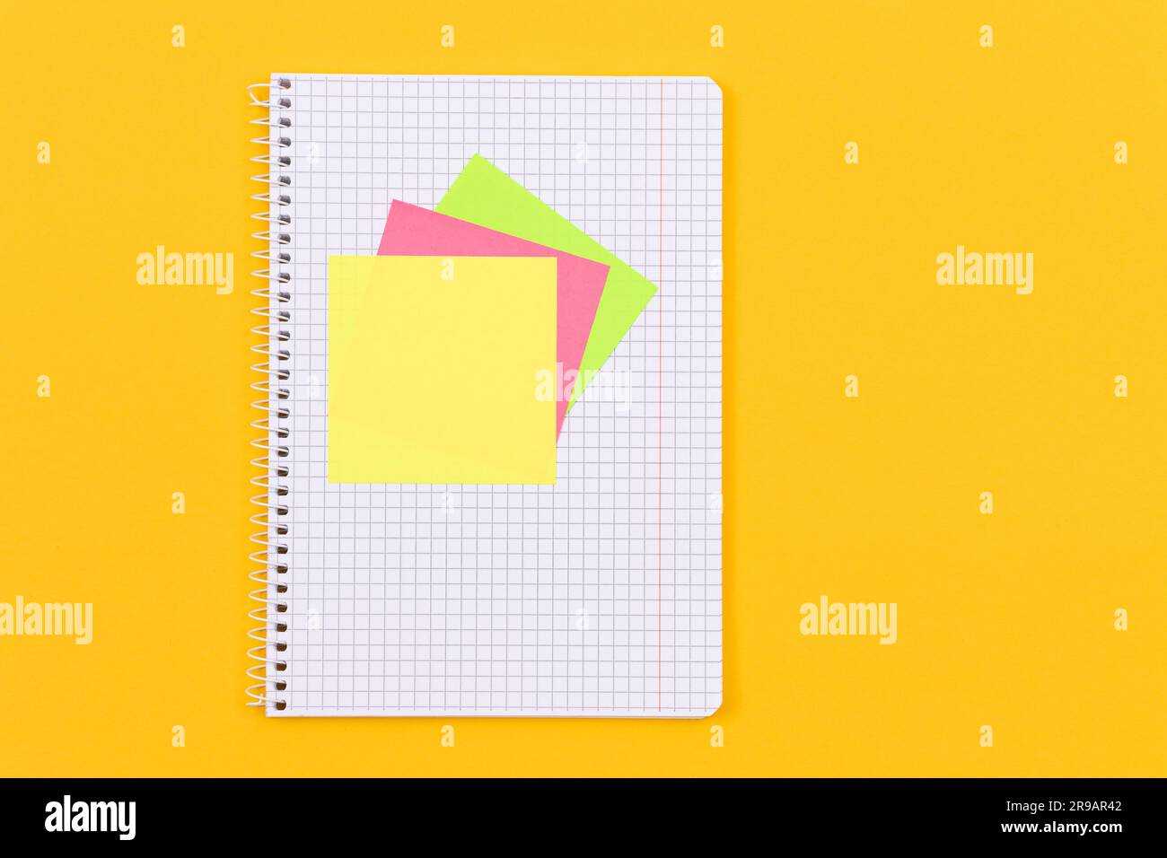 A Notepad with Sticky Notes Lying on Yellow Table - Blank Template. Top ...