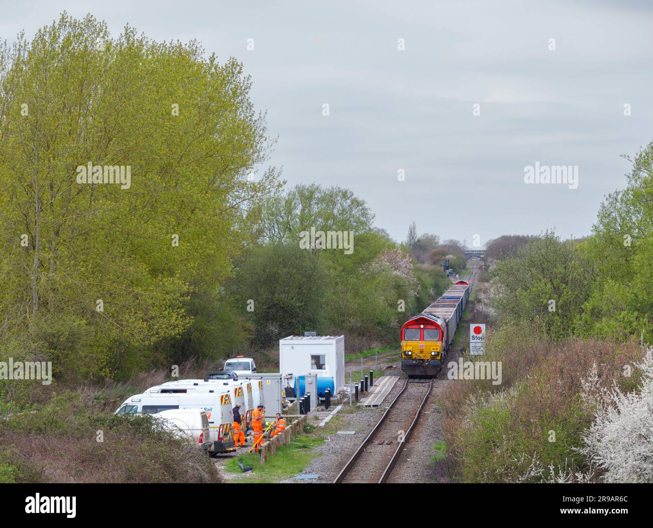 DB Cargo rail UK class 66 diesel locomotive hauling a train of empty ...