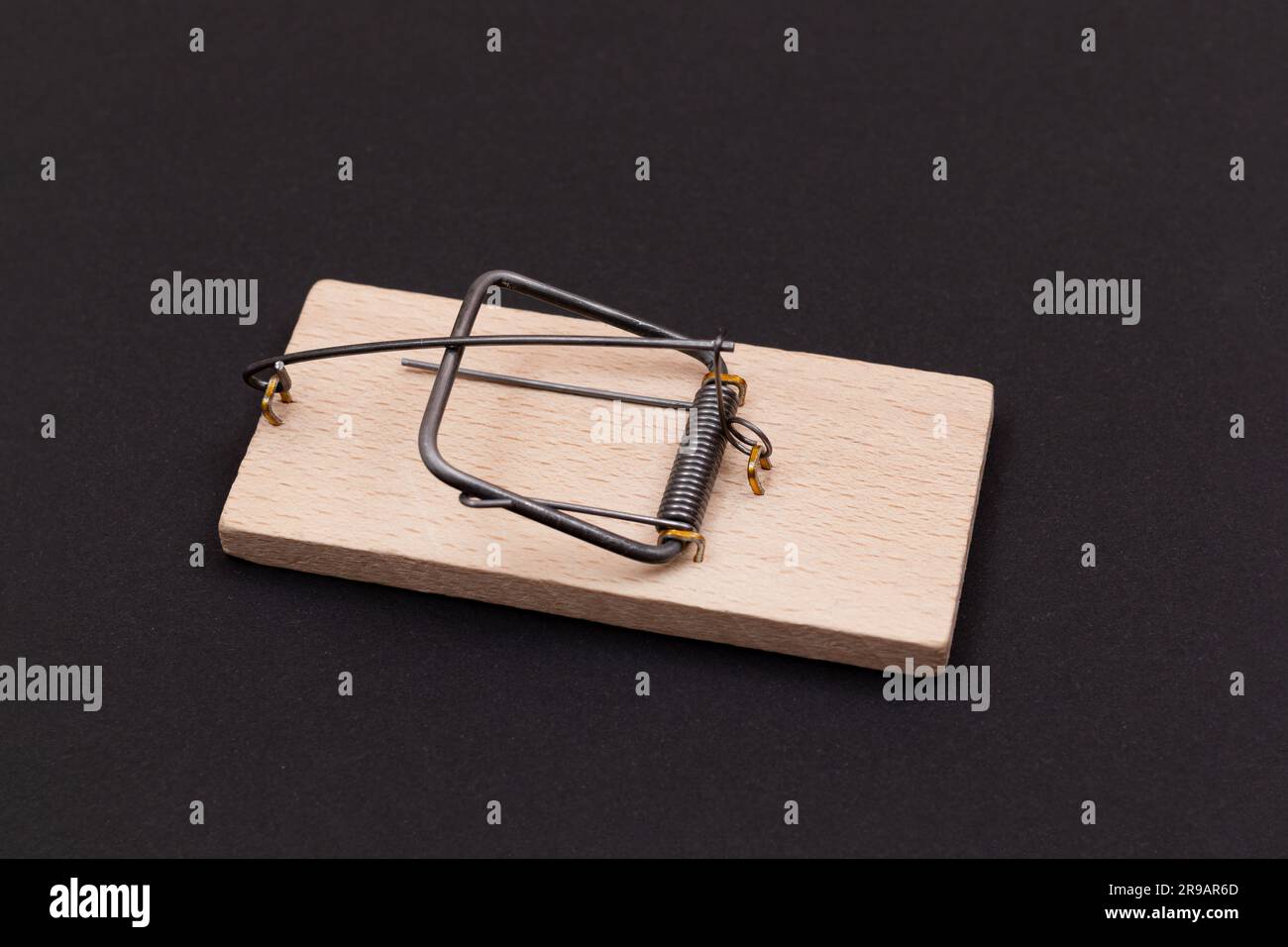 Wooden Mouse Trap. Empty Loaded Mousetrap on Black Background Stock ...