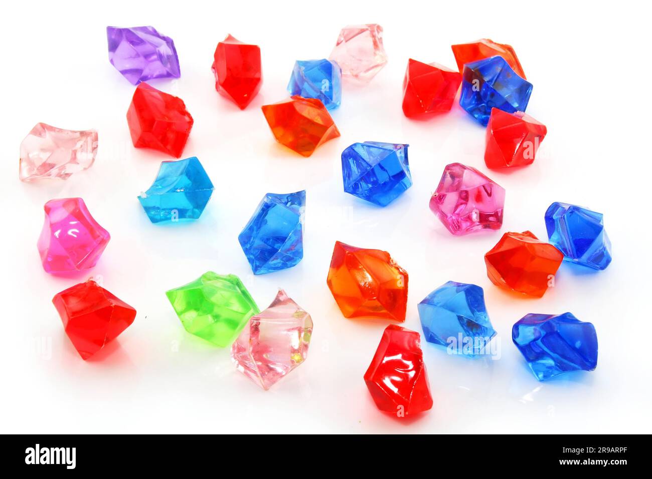 Colored assorted gemstones isolated on a white background Stock Photo ...