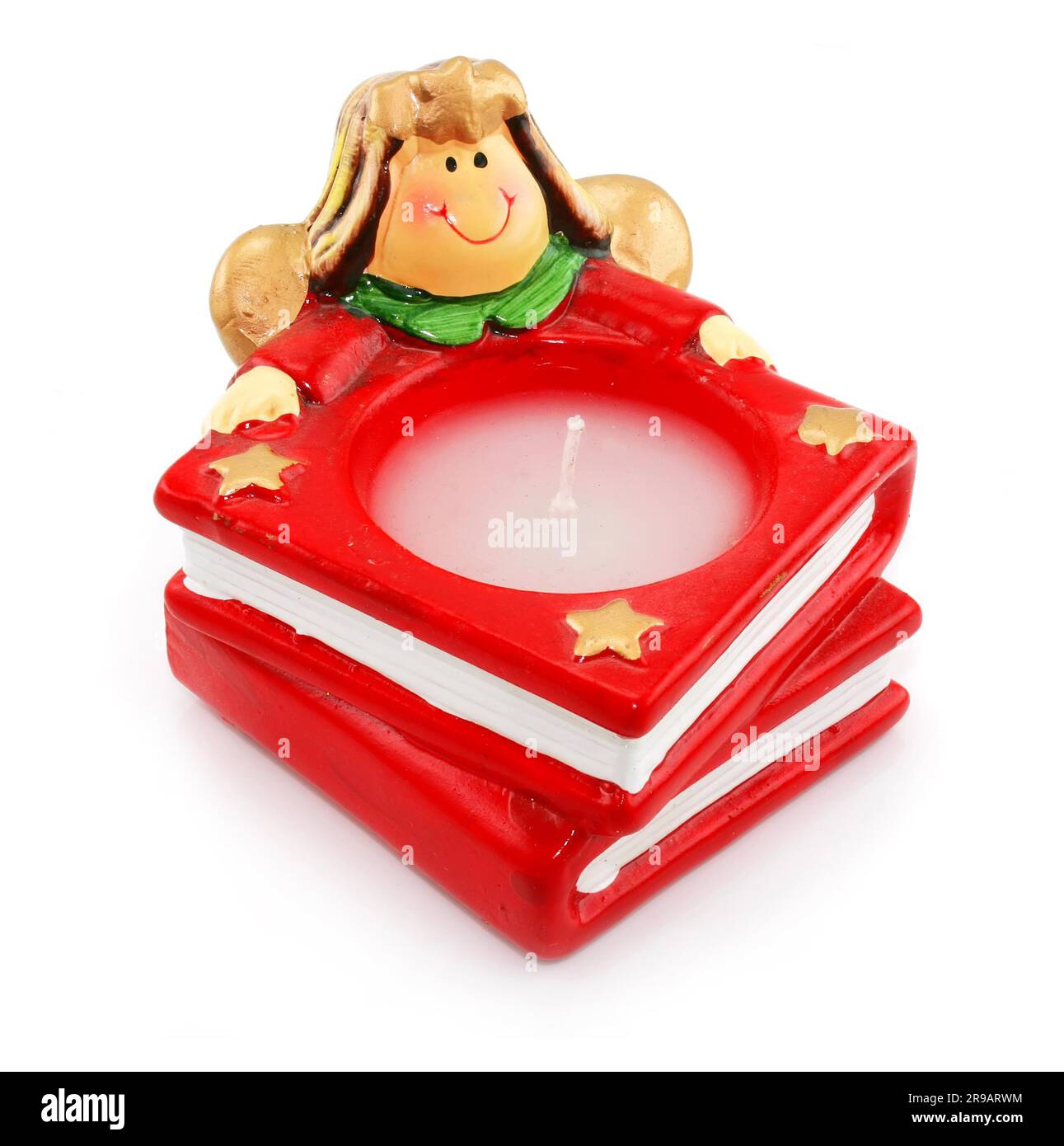 Toy figure candle isolated on a white background Stock Photo - Alamy