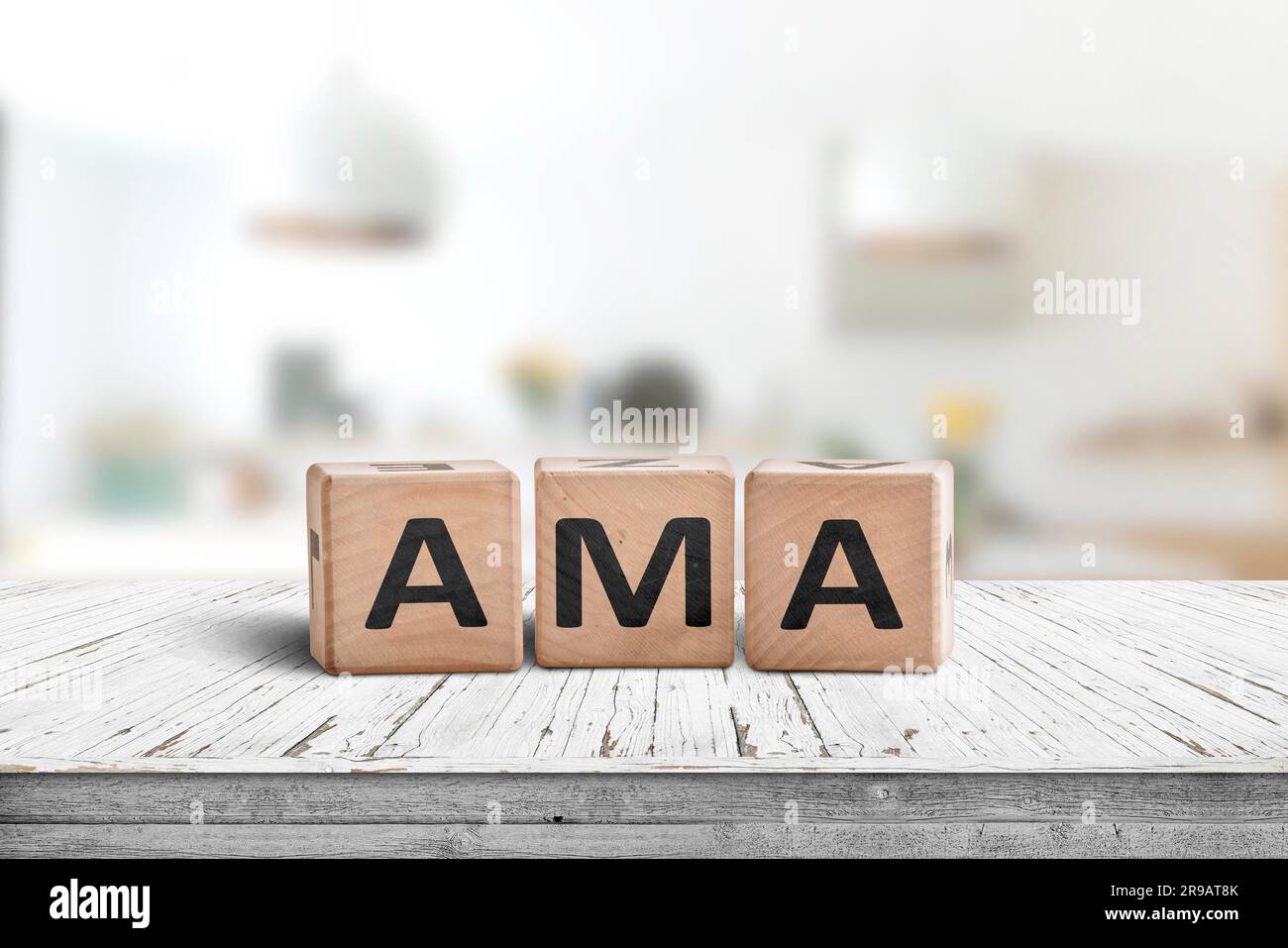 AMA ask me anything message made of wood in a bright room on a desk ...