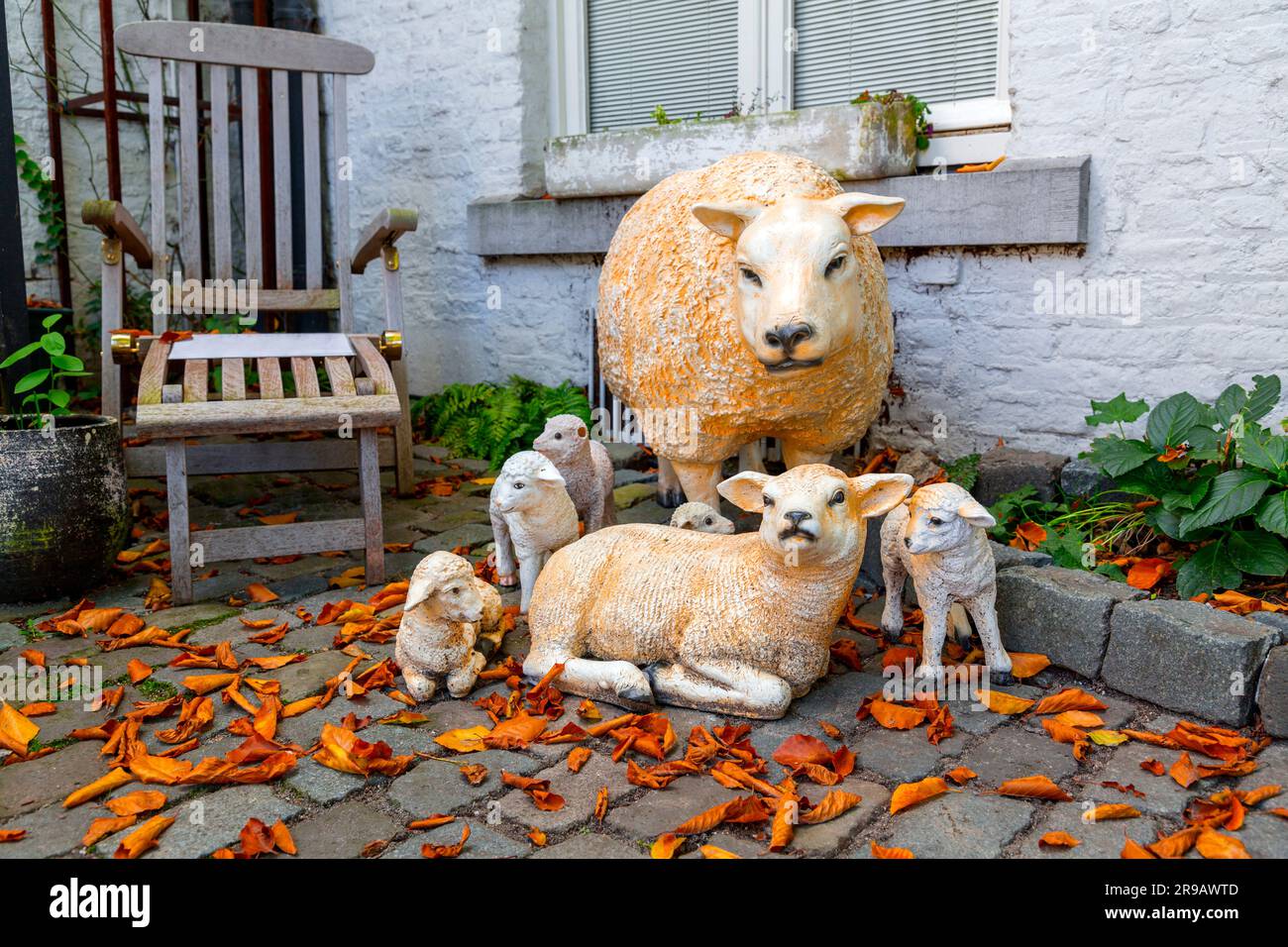 Group of ceramic sheep figurines, colorful garden decorations Stock ...