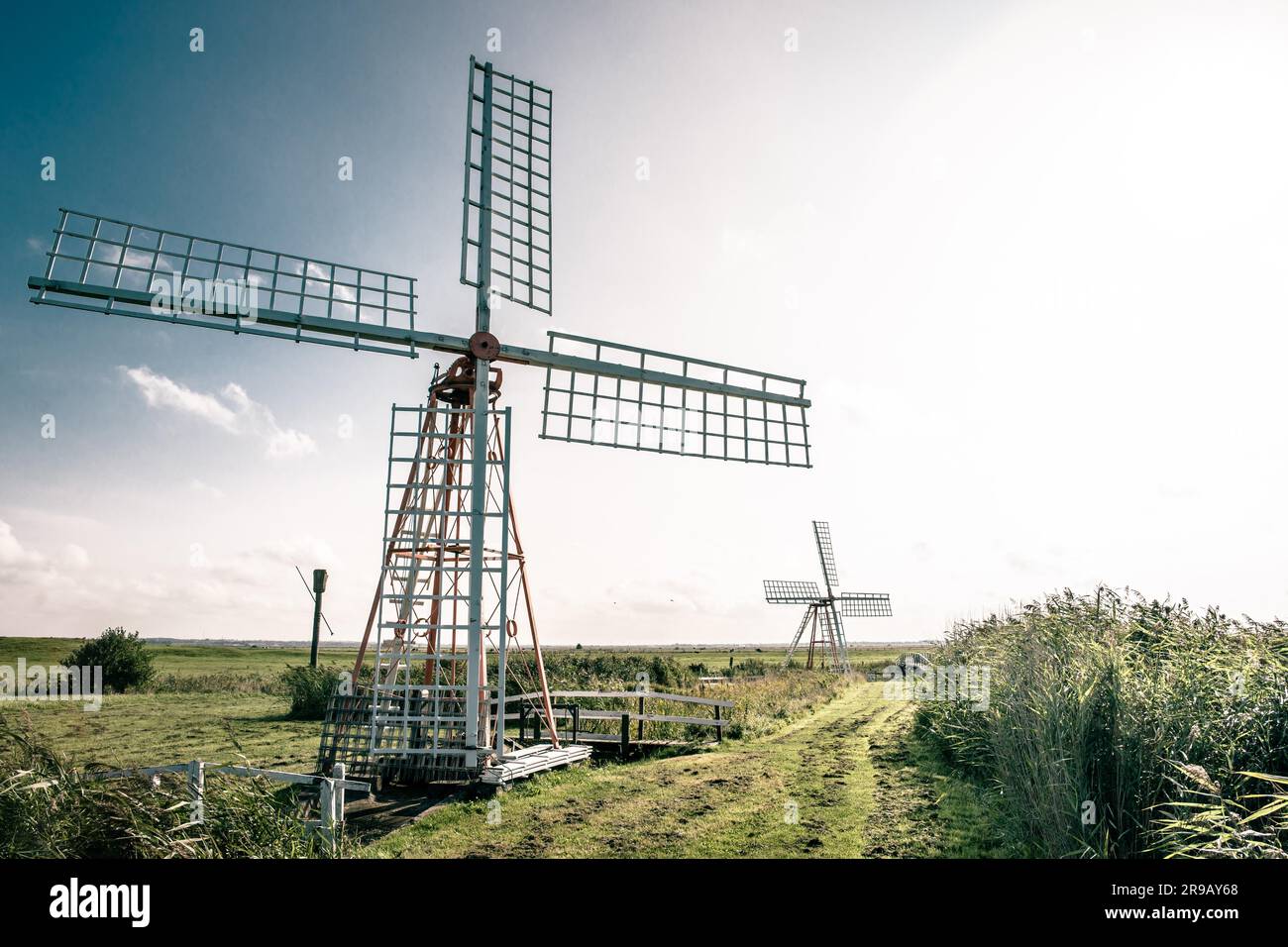 Old windmill in countryside scenery Stock Photo - Alamy