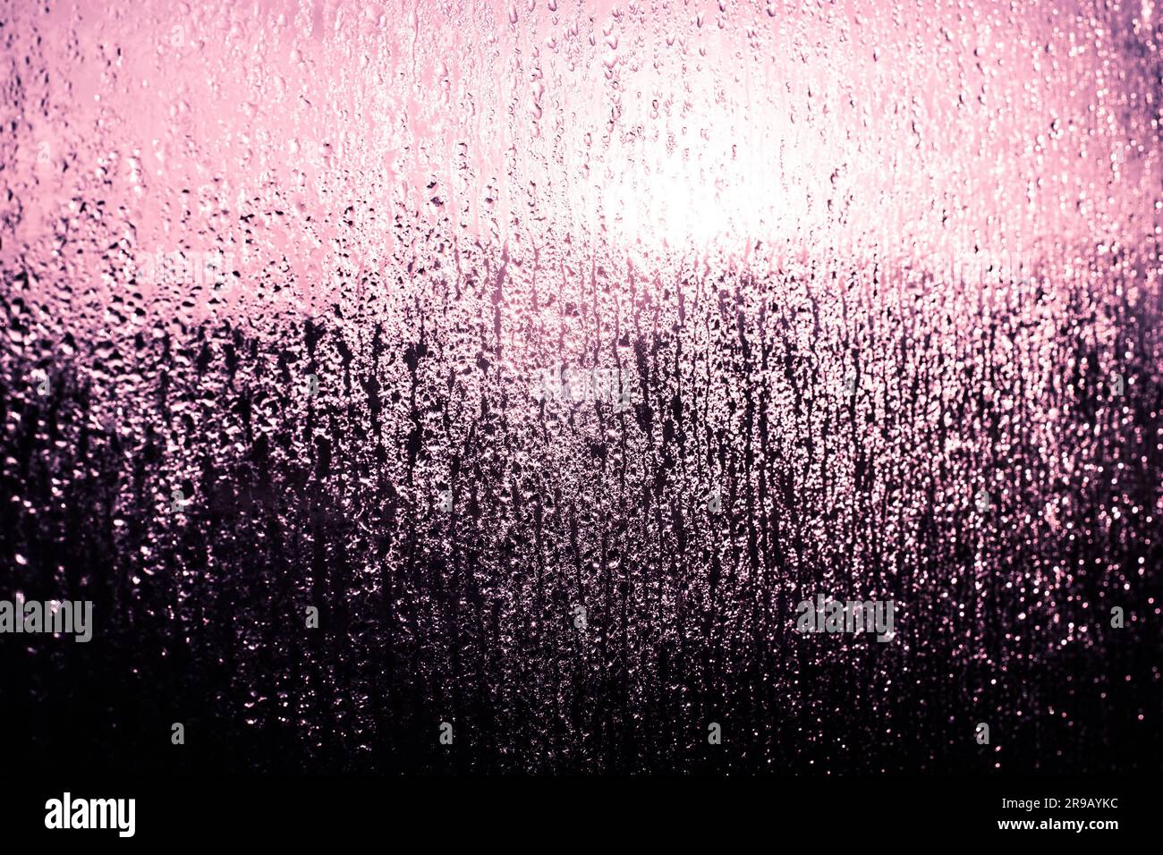 Moisty wet window with water running down the surface Stock Photo - Alamy