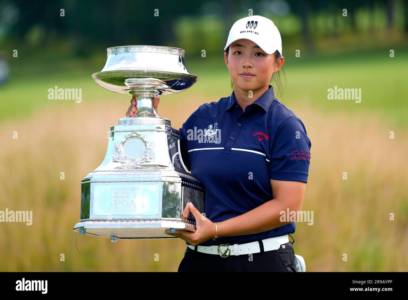 Ruoning Yin, of China, holds the trophy after winning the Women's PGA ...