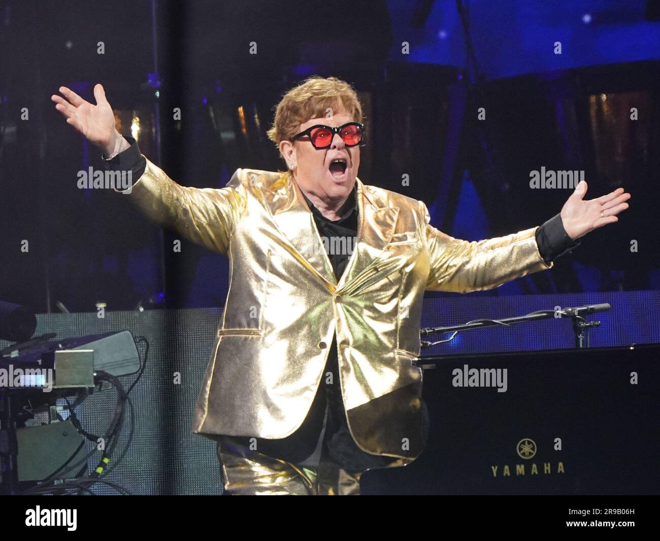 EDITORIAL USE ONLY Elton John performing on the Pyramid Stage at the ...