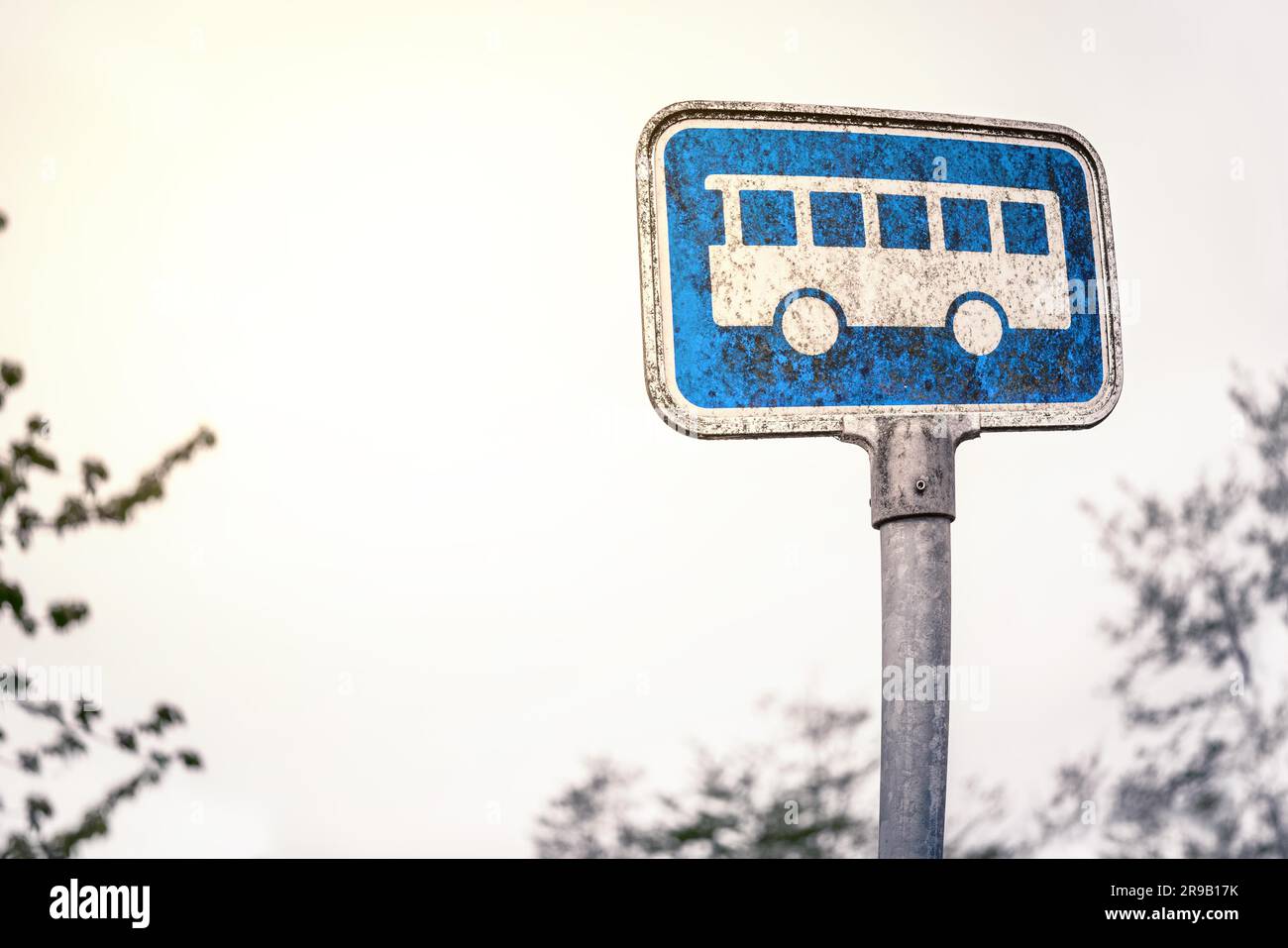 Retro bus stop sign in blue color Stock Photo - Alamy