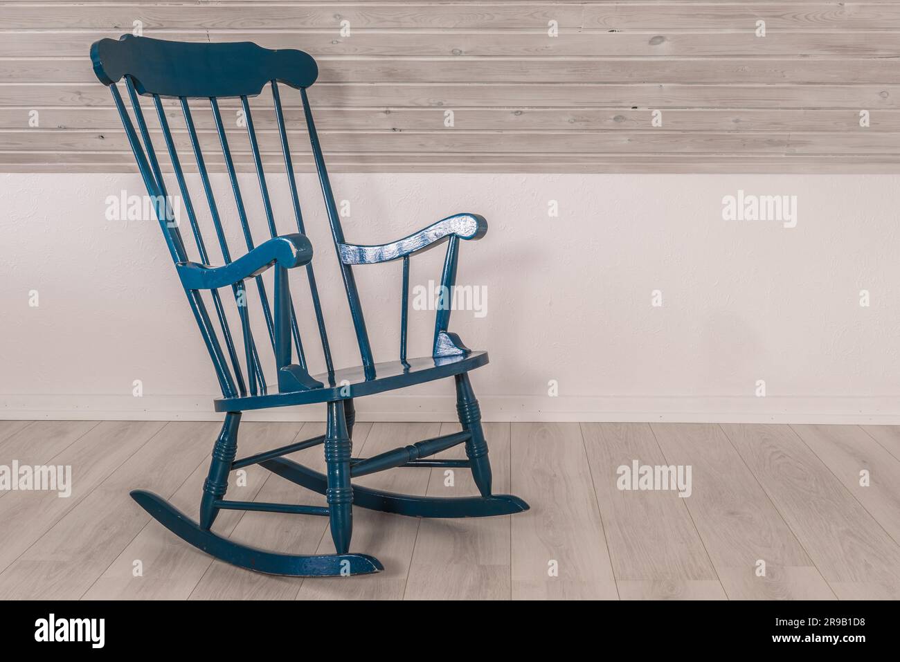 Blue rocking chair in a living room Stock Photo - Alamy
